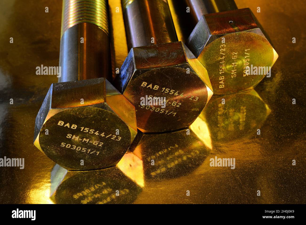 Large brass plated bolts Stock Photo - Alamy