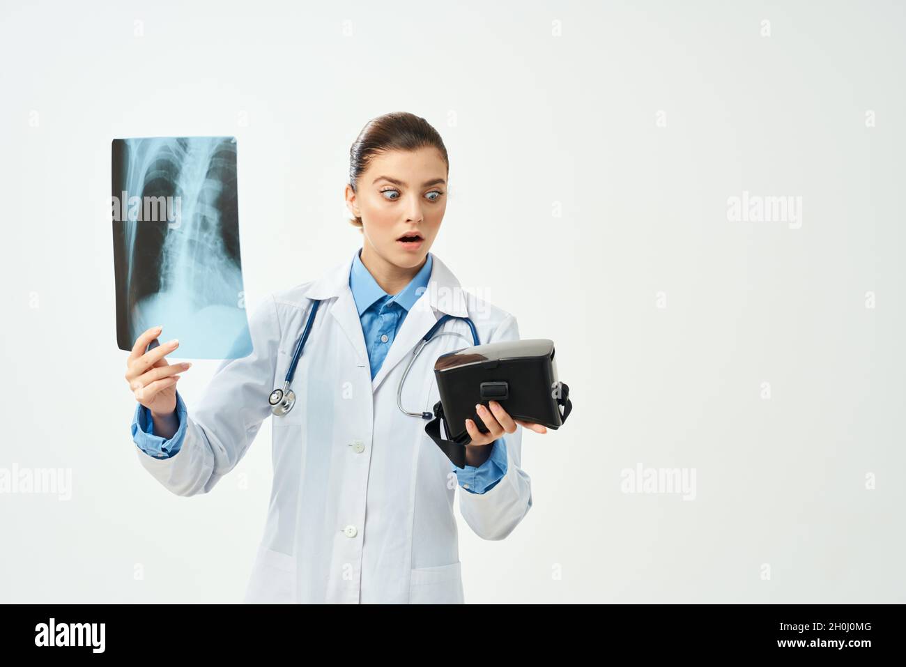 radiologist with x-ray health care light background Stock Photo - Alamy