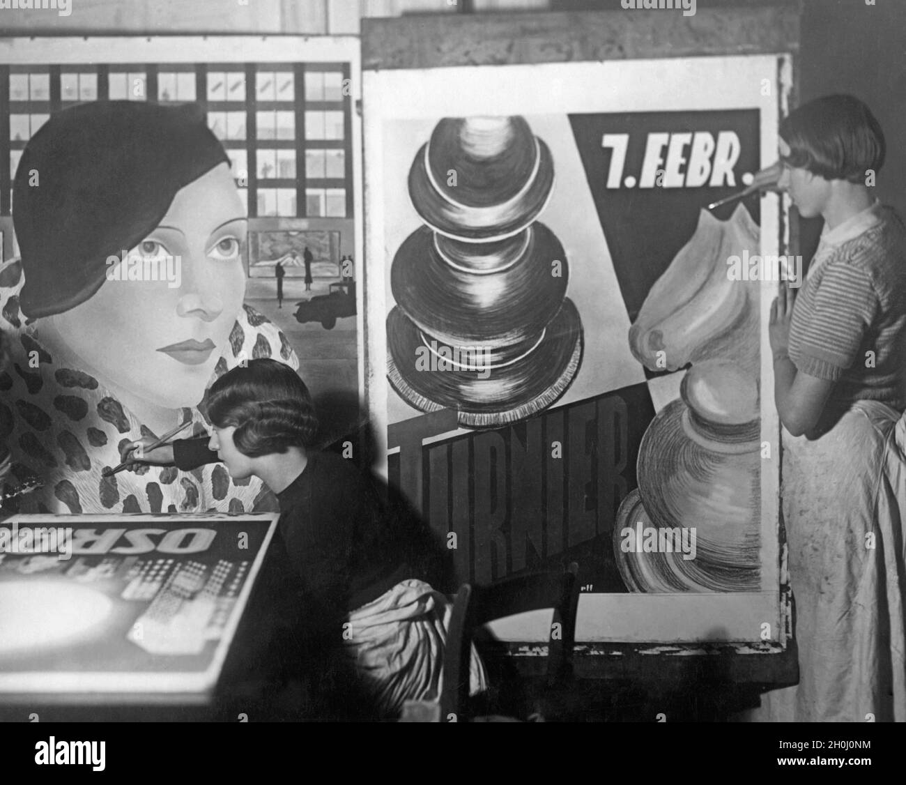 An advertising artist painting an advertising poster. (undated ...