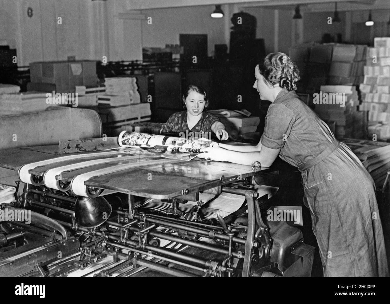 Workers in a factory. [automated translation] Stock Photo - Alamy