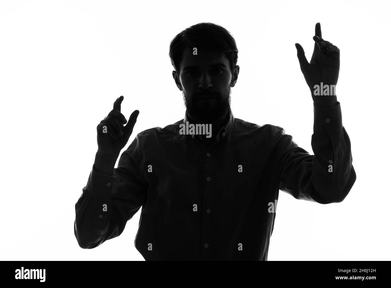 The man in a suit with a pistol in hand crime hand gesture isolated ...