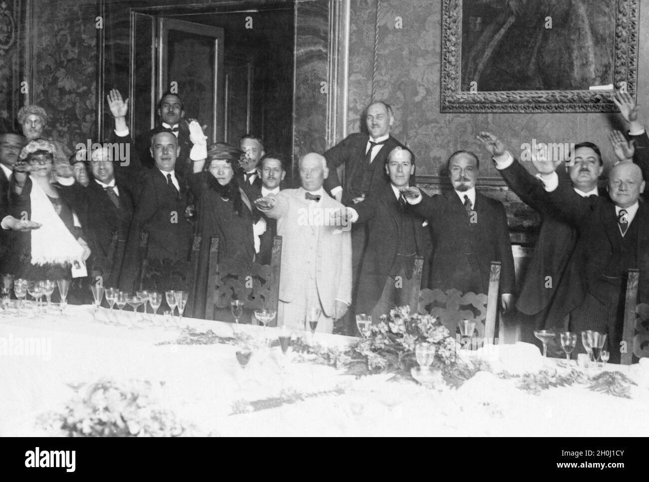 After a banquet in Rome in 1923, almost all the guests show the fascist ...
