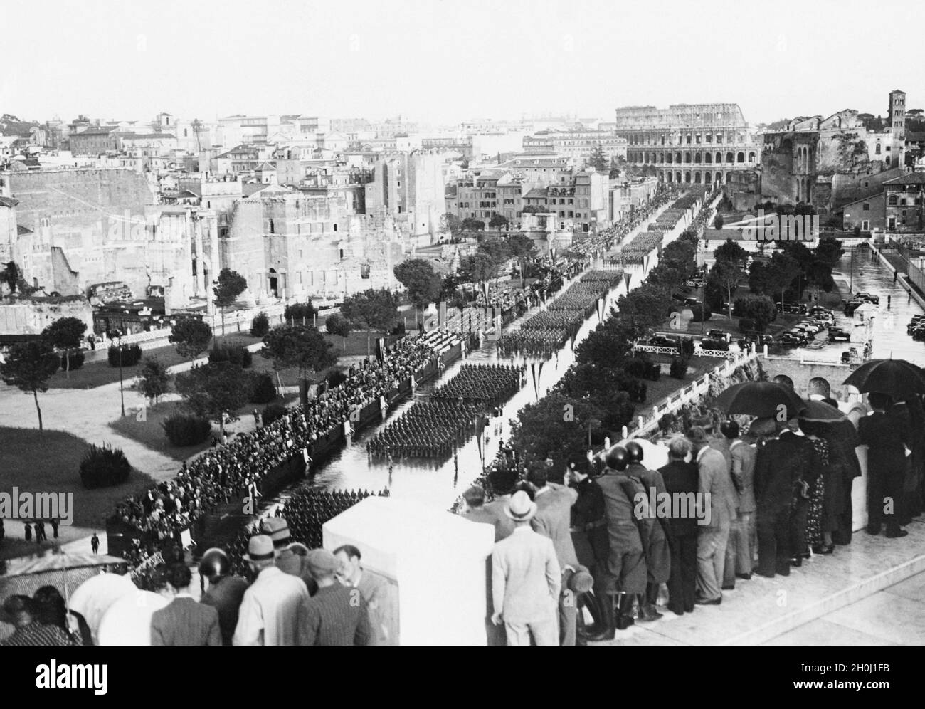 Spectators look from the Vittoriano at a parade of the Avanguardisti of ...