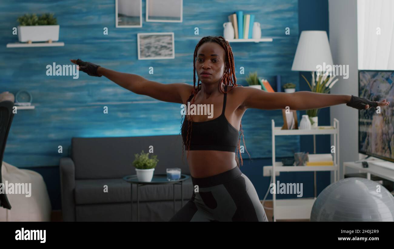 Athlete fit black woman wearing sportswear working body muscle doing ...