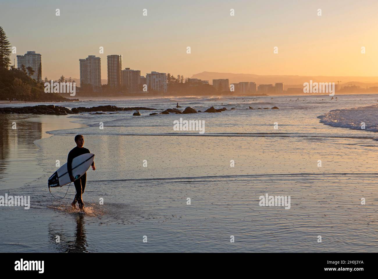 Surfer at Snapper Rocks, Coolangatta Stock Photo - Alamy
