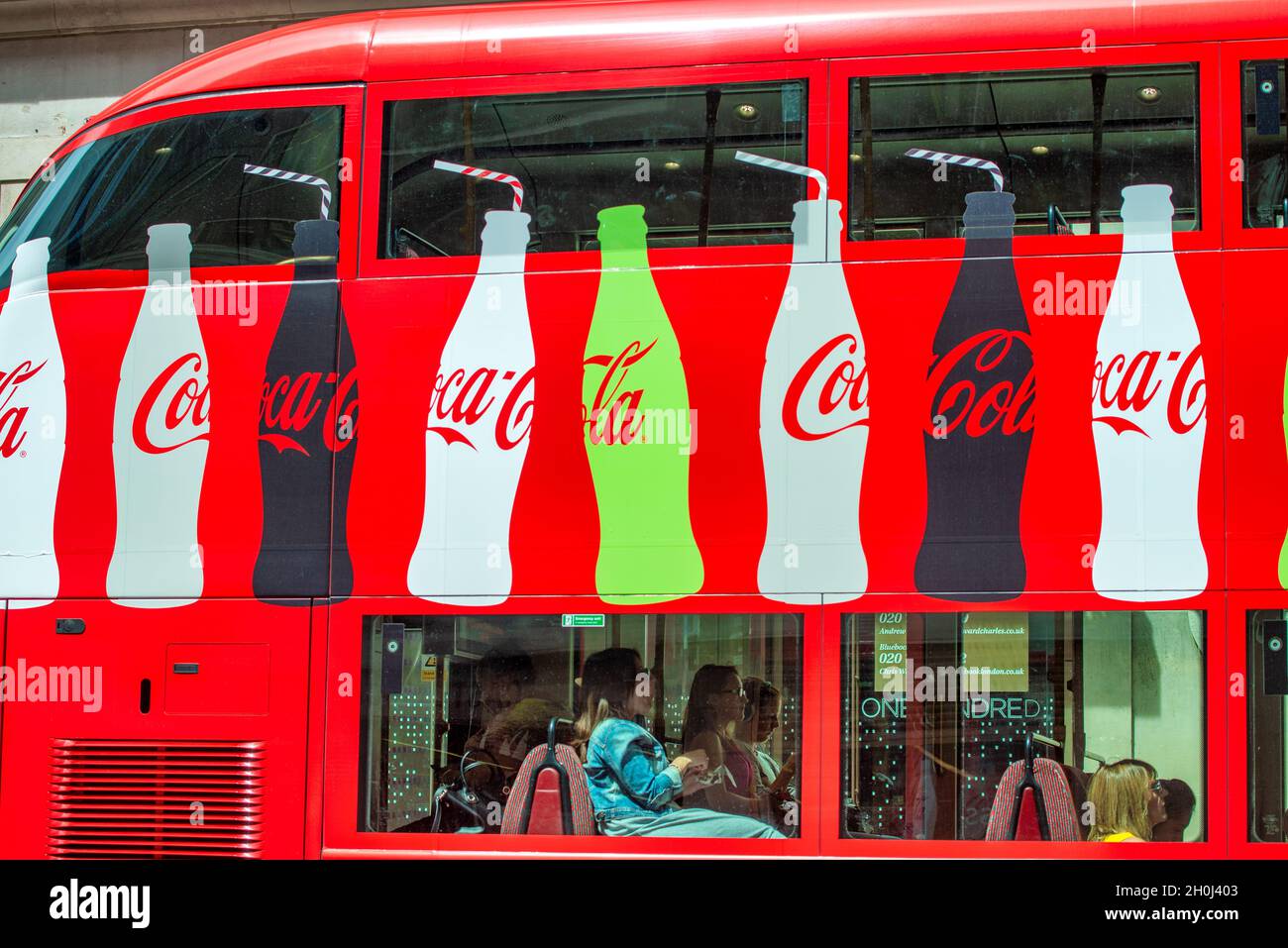 LONDON, UK - JUNE 29TH, 2015: Coca Cola advertising on a Red Double ...