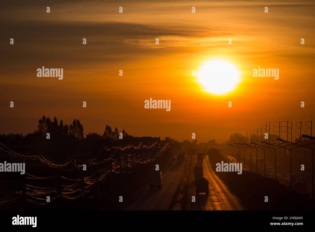 Empty road power lines at sunset hi-res stock photography and images ...