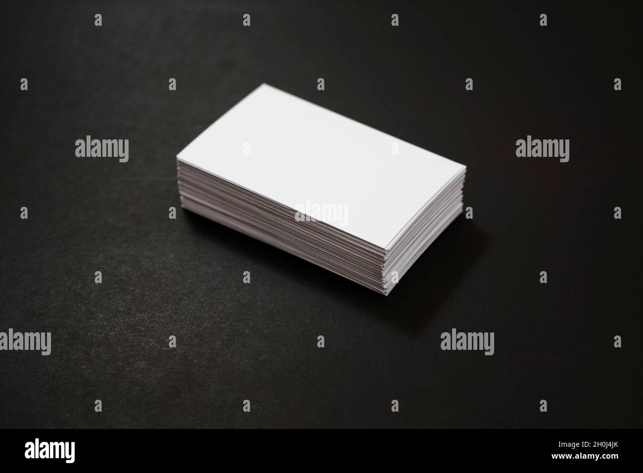 blank business cards stack up on Black background Stock Photo - Alamy
