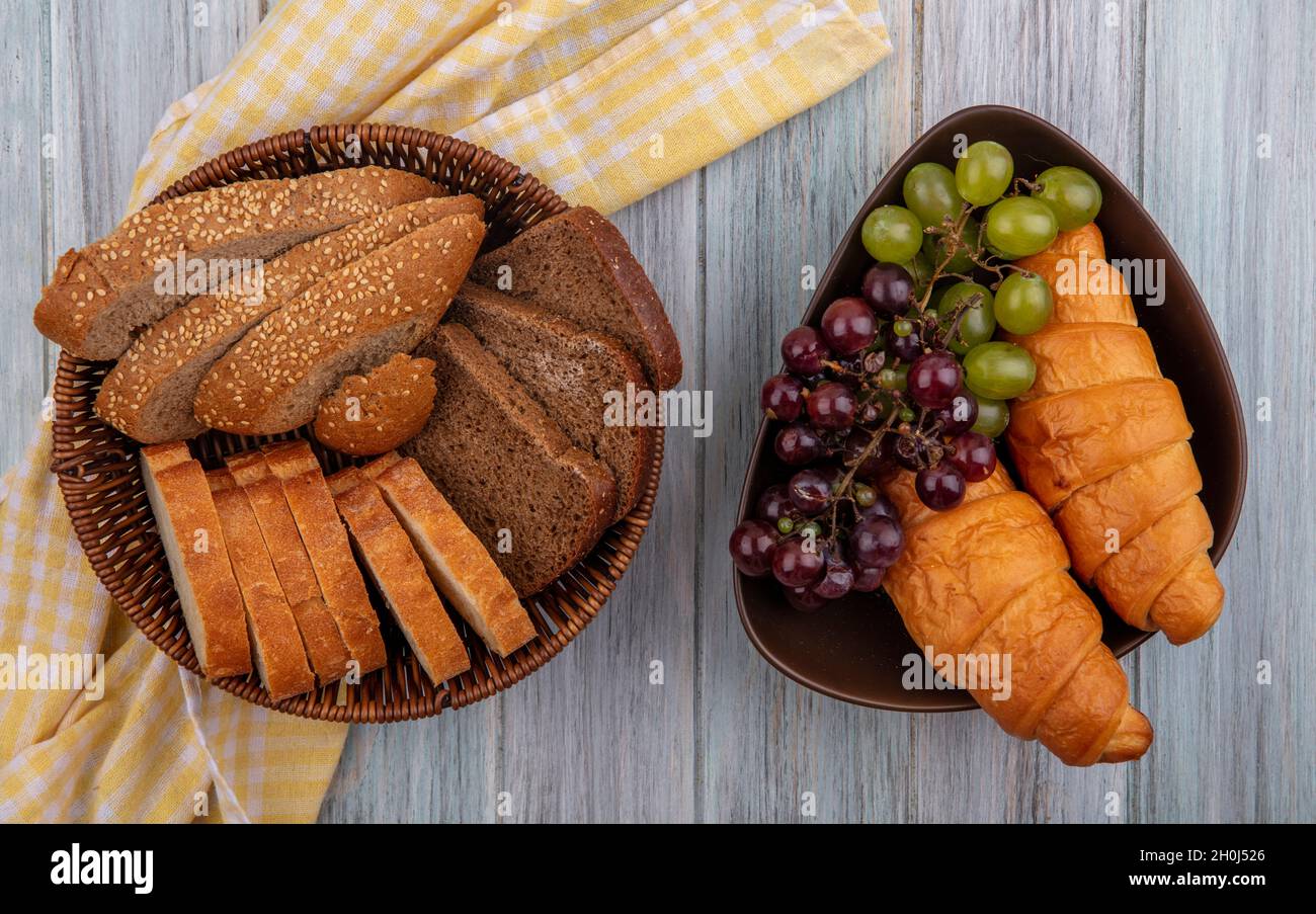 top view of breads as sliced seeded brown cob rye and crusty ones in ...