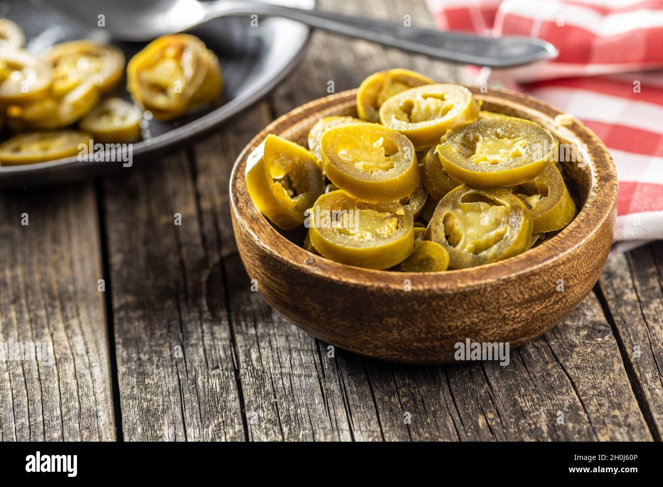 Pickled sliced jalapeno. Green jalapeno peppers in bowl Stock Photo - Alamy Pickled sliced jalapeno. Green jalapeno peppers in bowl Stock Photo - Alamy