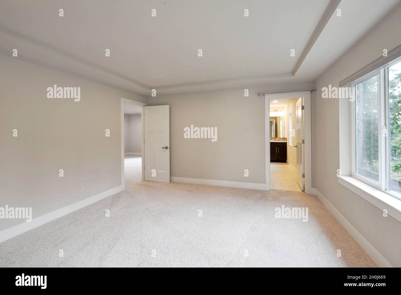 Modern residential empty bedroom interior Stock Photo - Alamy