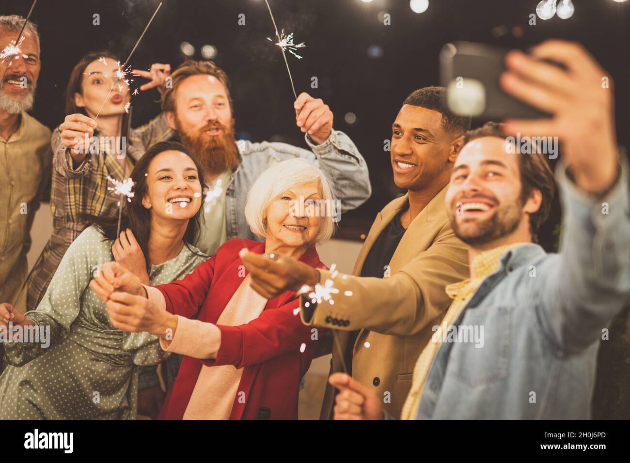 Storytelling footage of a multiethnic group of people dining on a ...