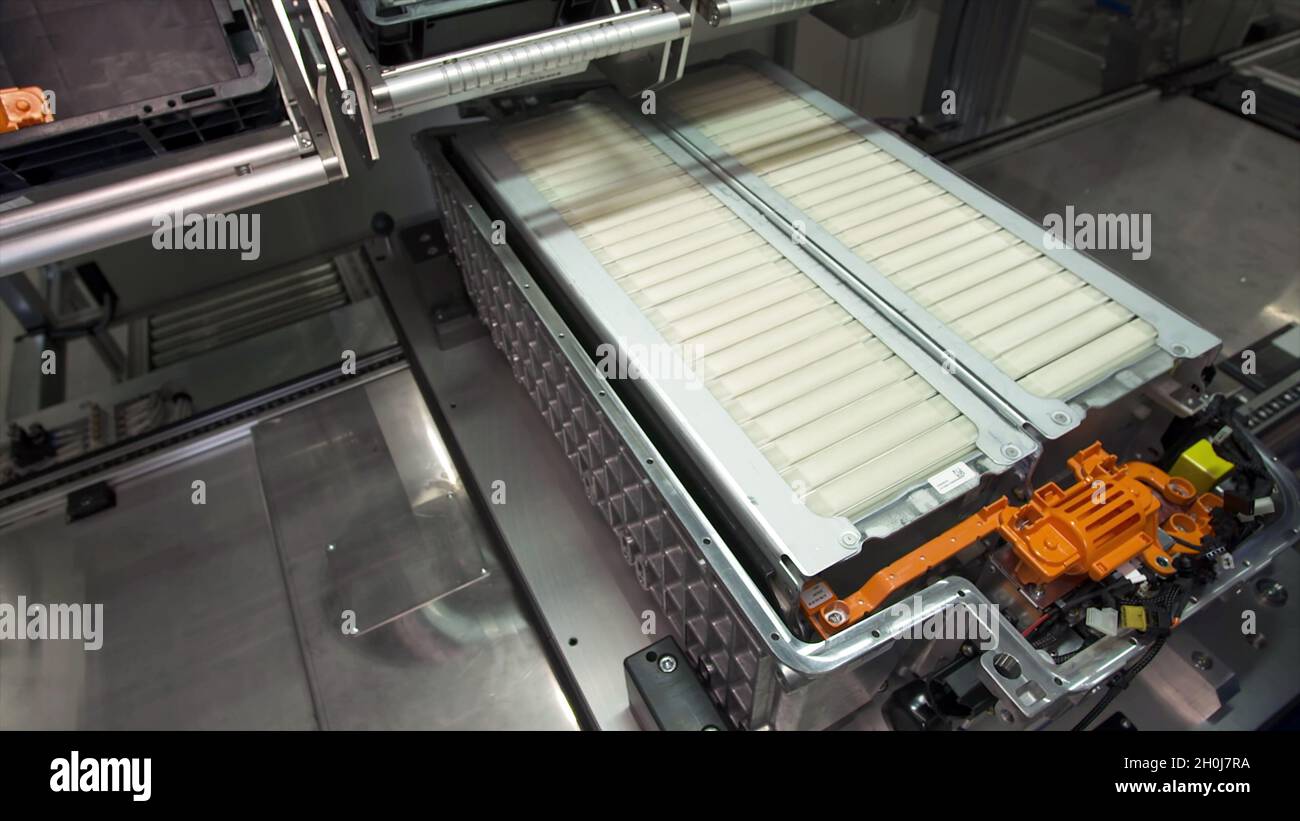 Close-up of an electric car battery in a factory on the assembly line ...