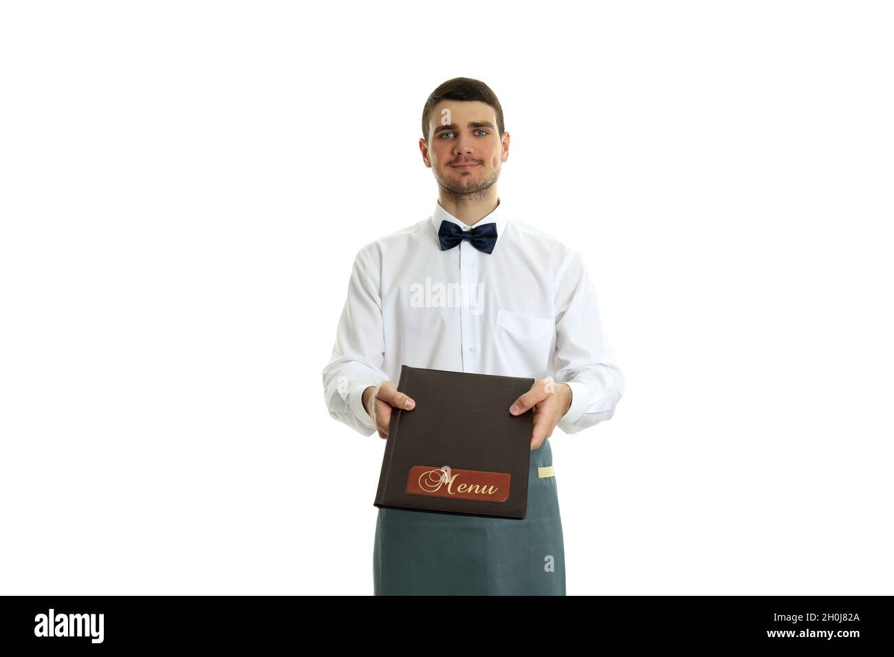 Young man waiter holds menu, isolated on white background Stock Photo ...