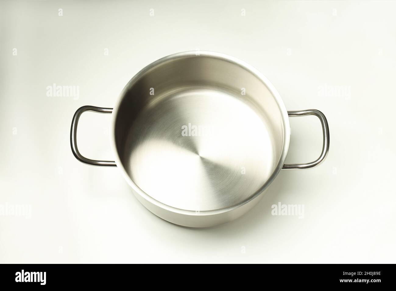 Metal empty pot on white background, above view Stock Photo - Alamy