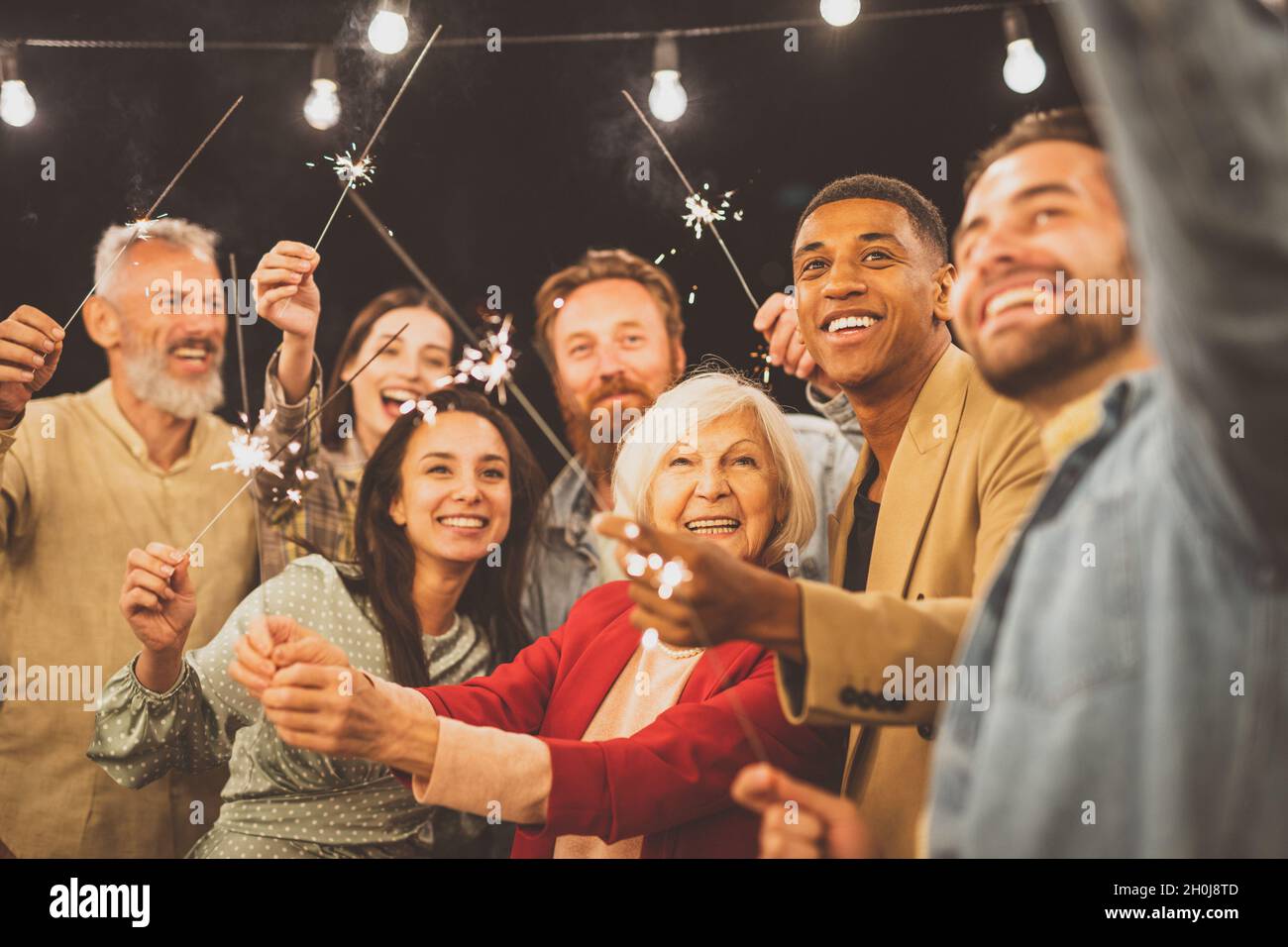 Storytelling footage of a multiethnic group of people dining on a ...