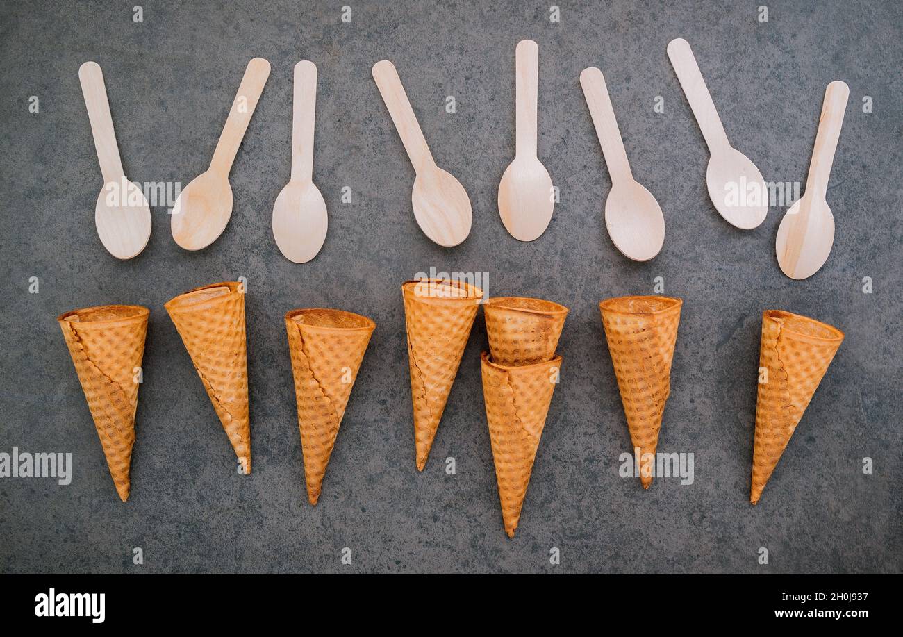 Flat lay ice cream cones collection on dark stone background . Blank ...