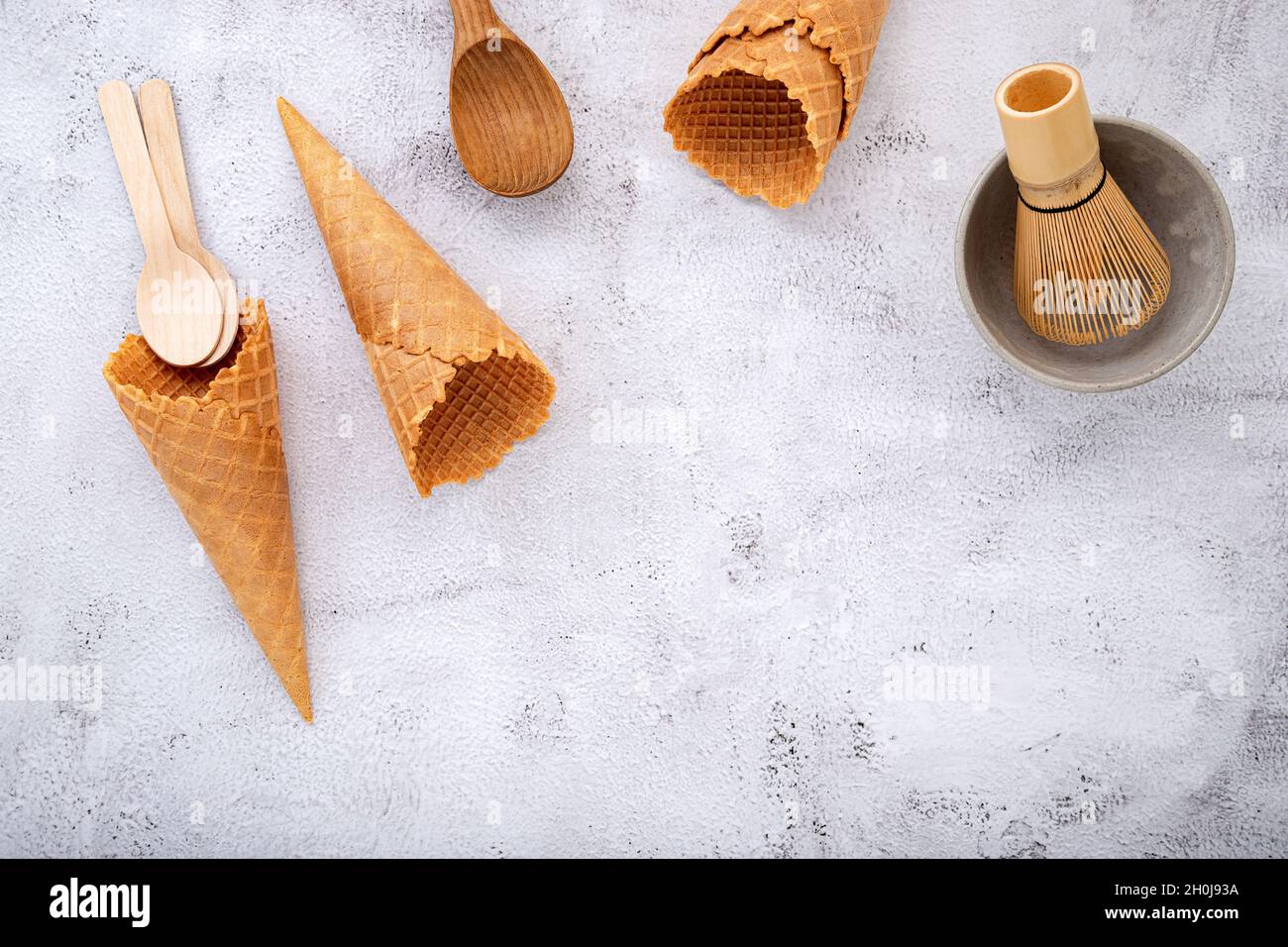 Flat lay ice cream cones collection on dark stone background . Blank ...