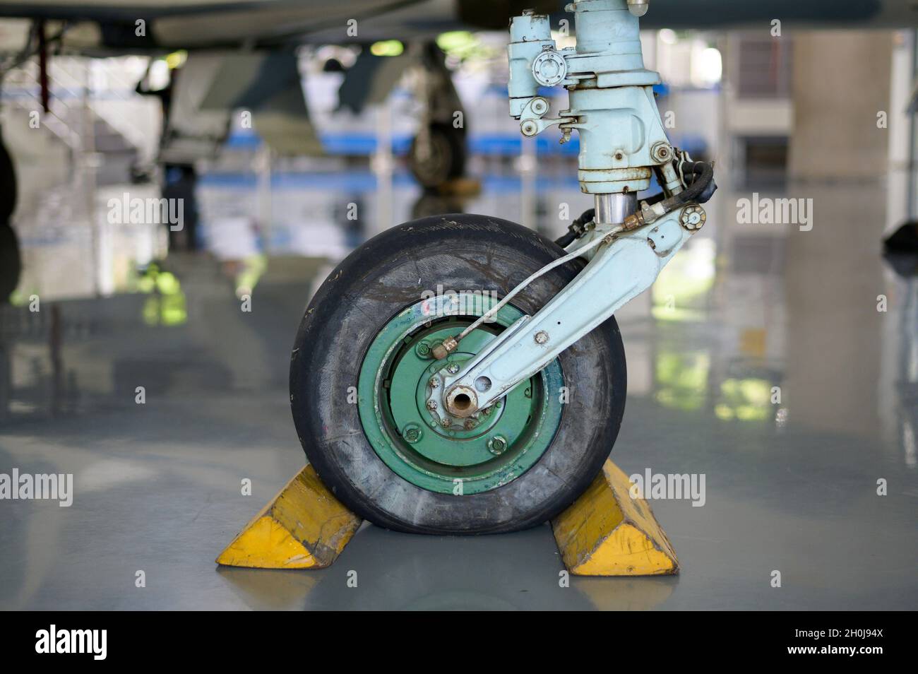 Close up of airplane wheel in an airfield Stock Photo - Alamy