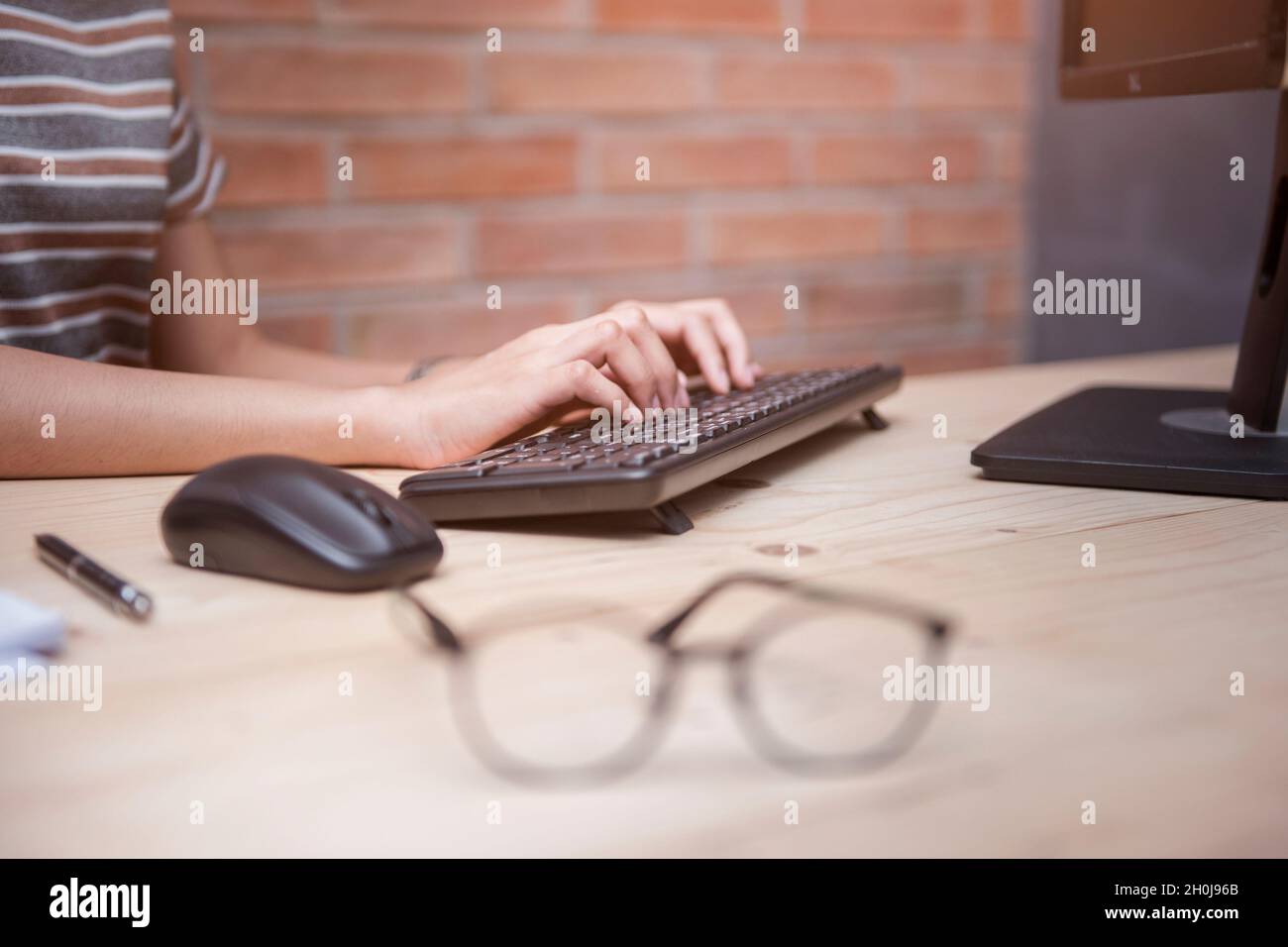 Desk and hands close up in home office Stock Photo - Alamy
