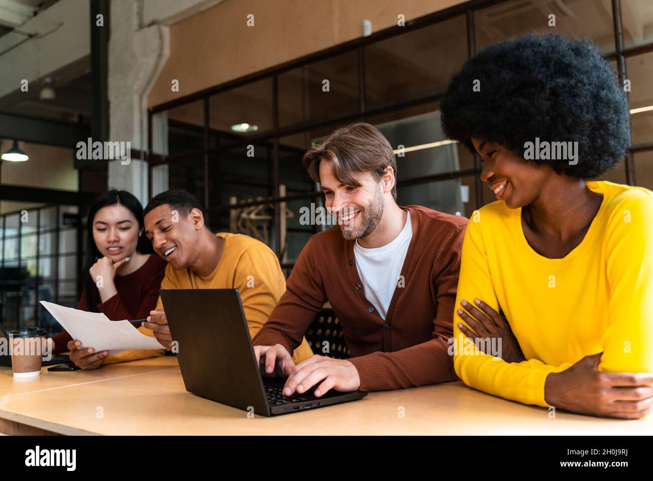 start up business team in the office. Employees at work on a new ...