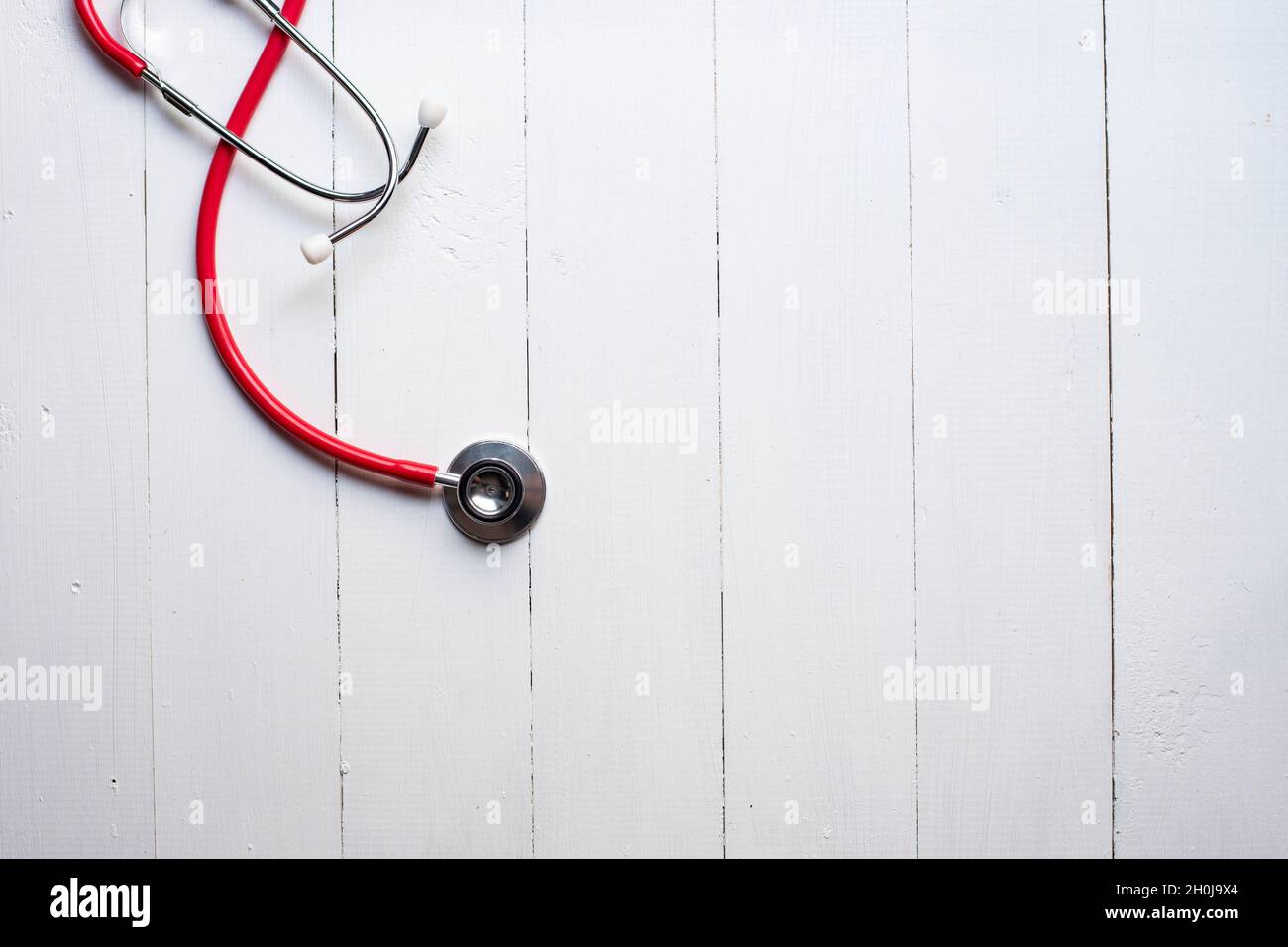 Medical background on white wood table Stock Photo - Alamy