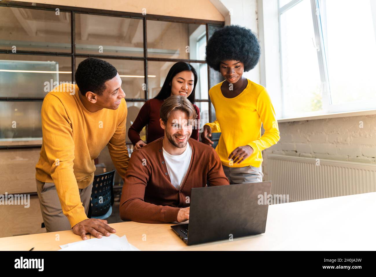 start up business team in the office. Employees at work on a new ...