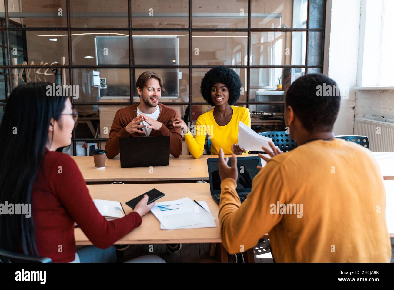 start up business team in the office. Employees at work on a new ...