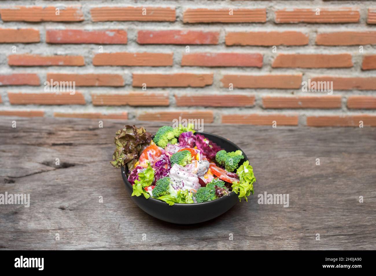 Salad on wood table ,Healthy food concept Stock Photo - Alamy