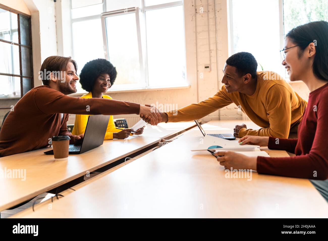 start up business team in the office. Employees at work on a new ...