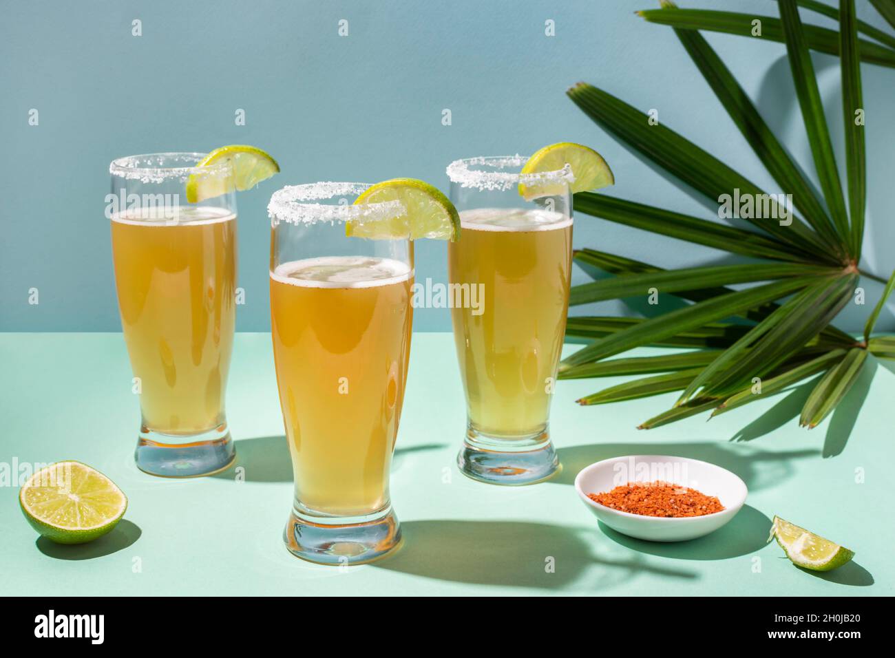 Spicy michelada drink assortment table Stock Photo - Alamy