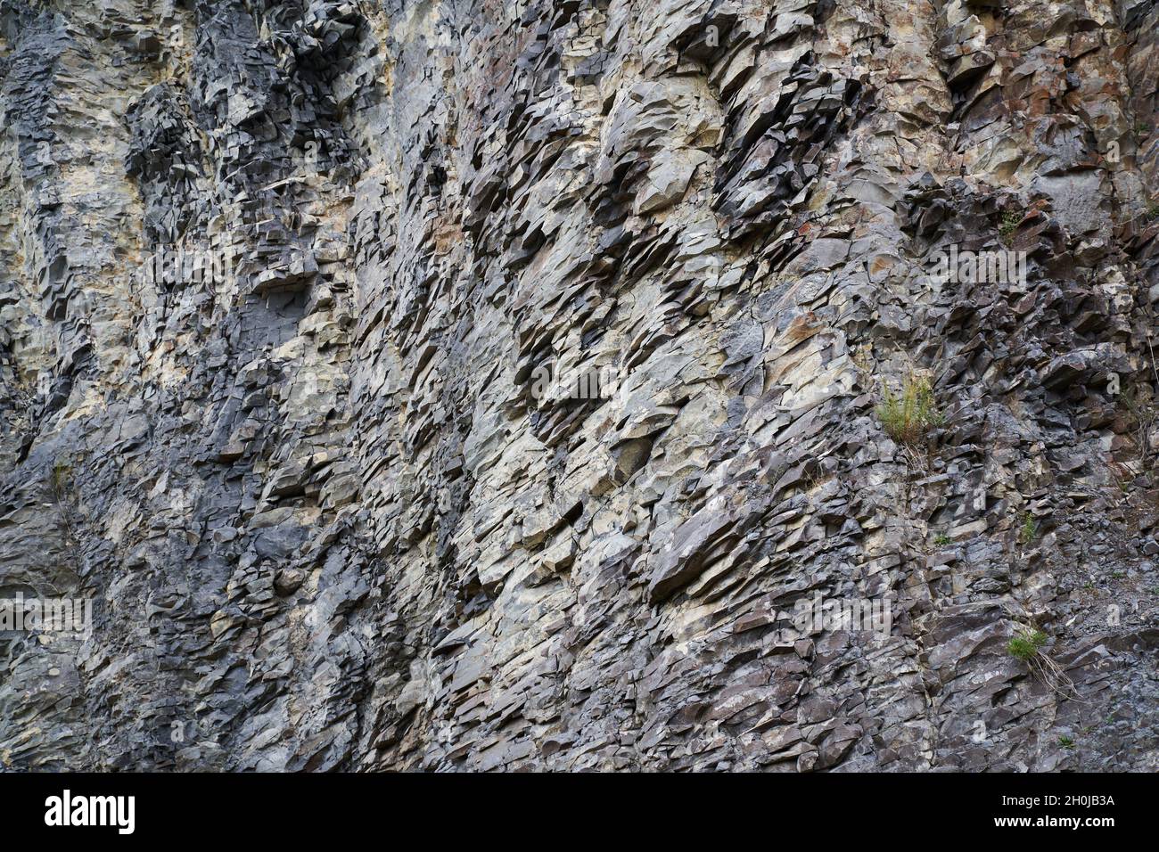 Various rock formation in geological layers in an abandoned quarry ...