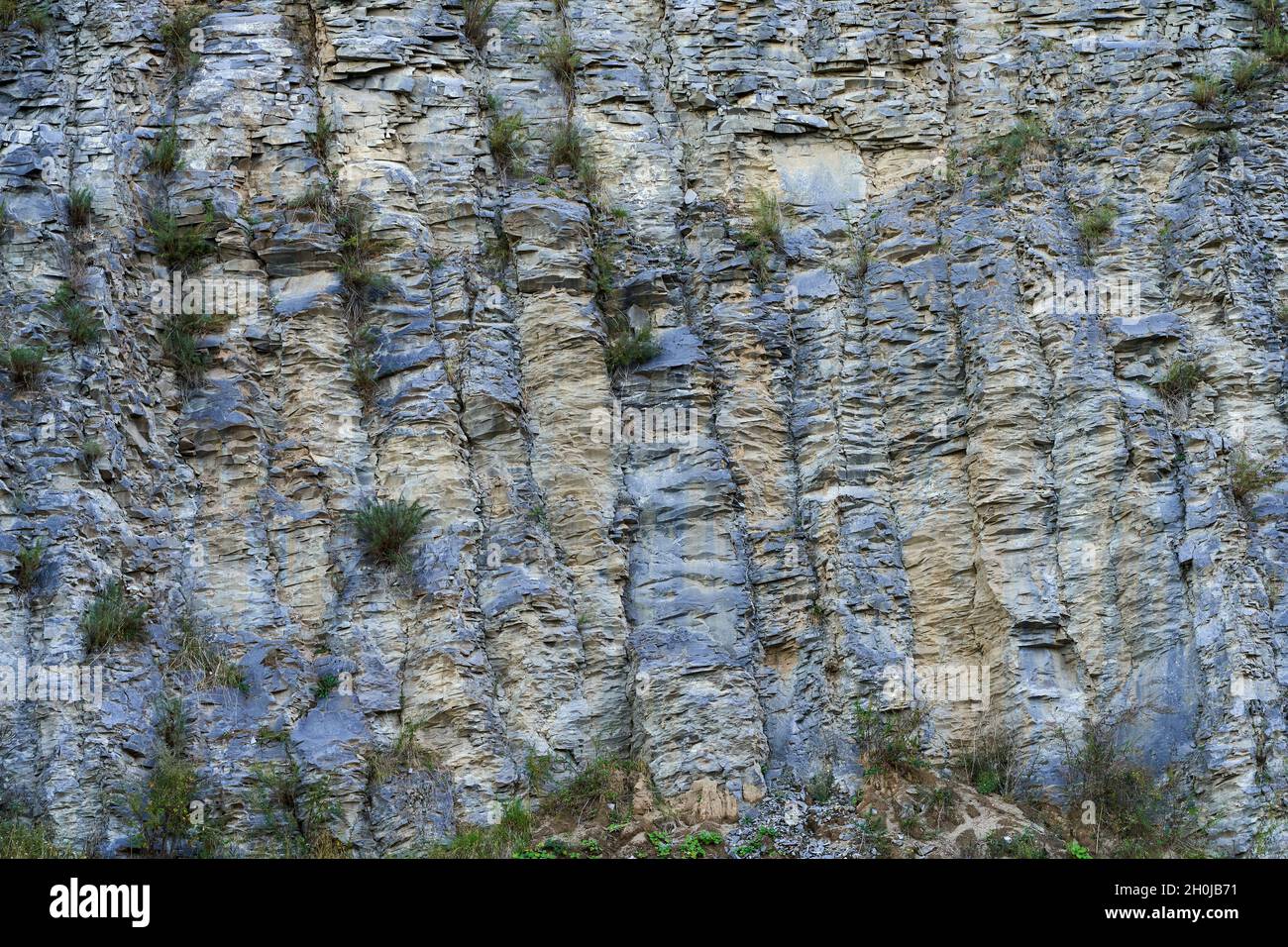 Various rock formation in geological layers in an abandoned quarry ...