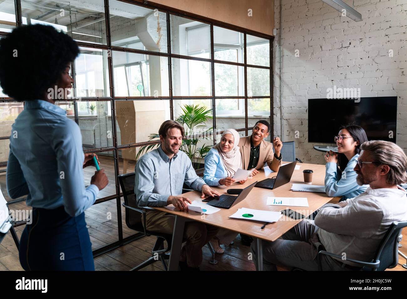 start up business team in the office. Multiethnic group working ...