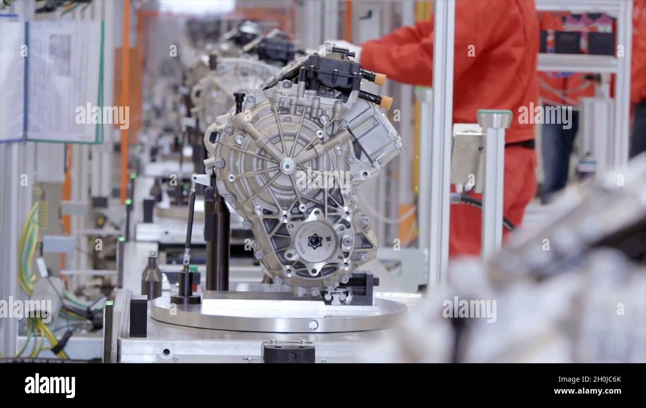 Close-up of an electric or hydrogen fuel cell car engine in a factory ...
