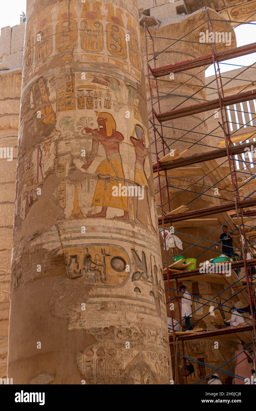 Luxor, Egypt - September 21, 2021: Cleaning of the 134 columns in the ...
