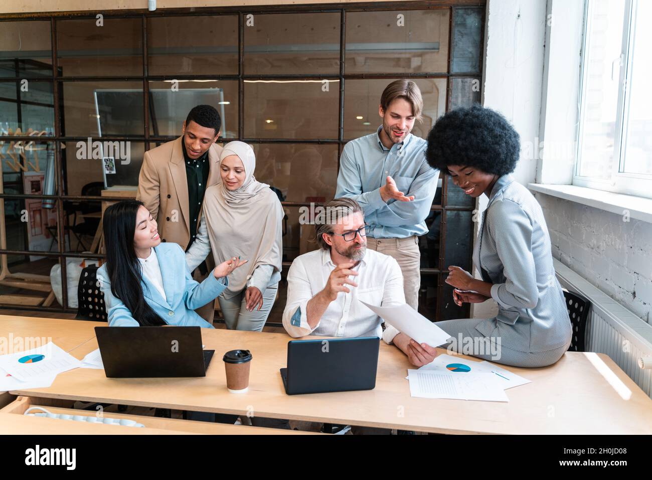 start up business team in the office. Multiethnic group working ...