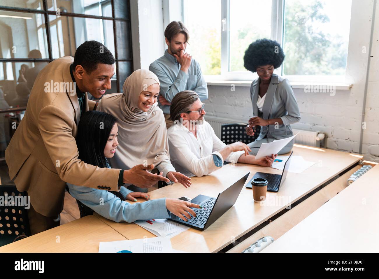 start up business team in the office. Multiethnic group working ...