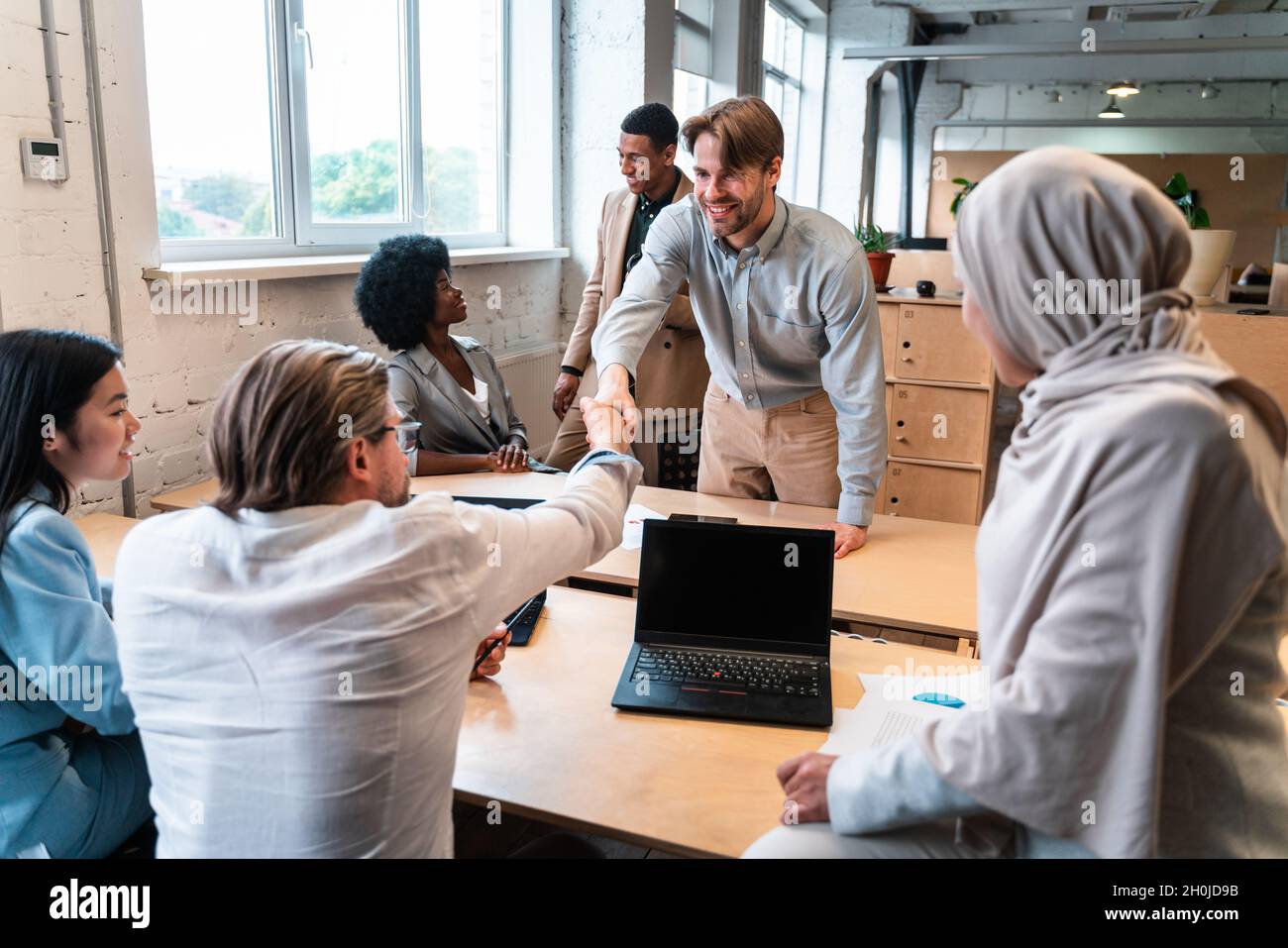 start up business team in the office. Multiethnic group working ...