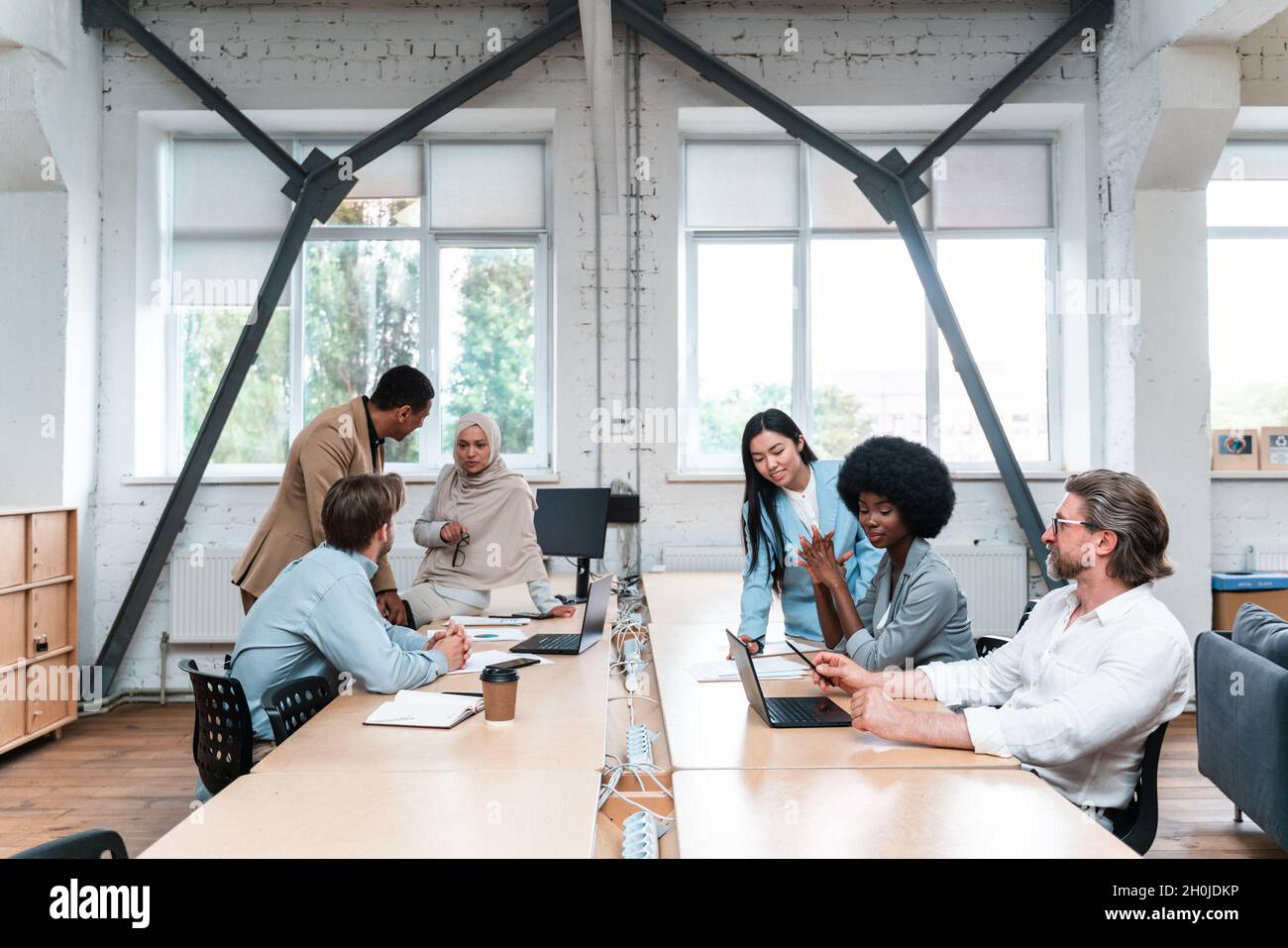 start up business team in the office. Multiethnic group working ...