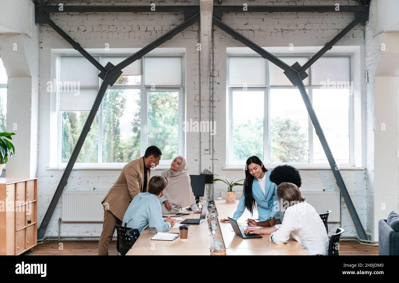 start up business team in the office. Multiethnic group working ...