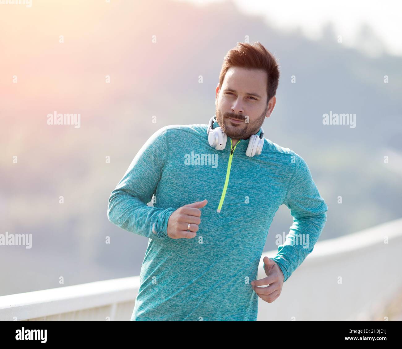 Handsome man running hi-res stock photography and images - Alamy