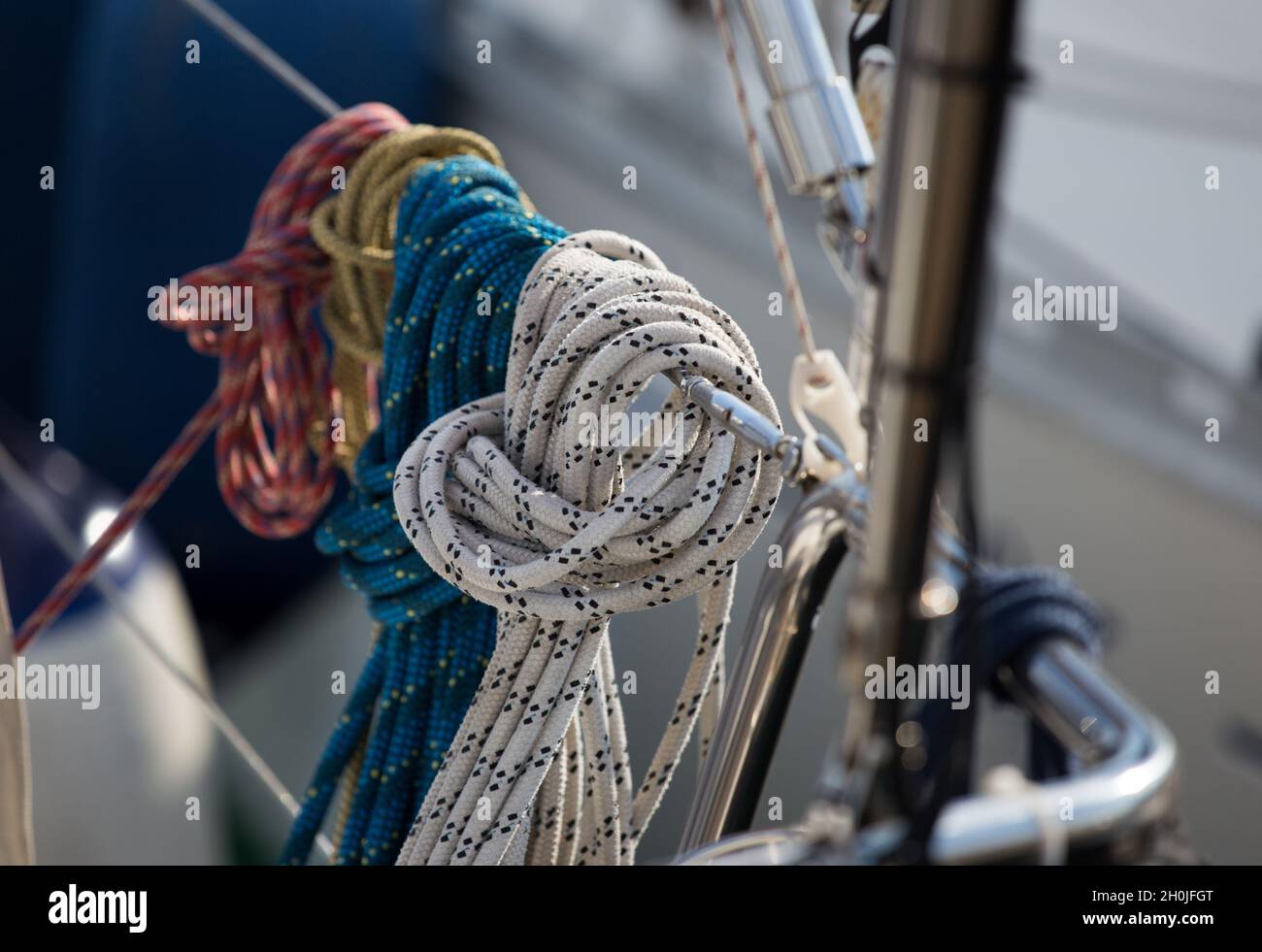 Close up of ropes tied to railings on yacht Stock Photo - Alamy