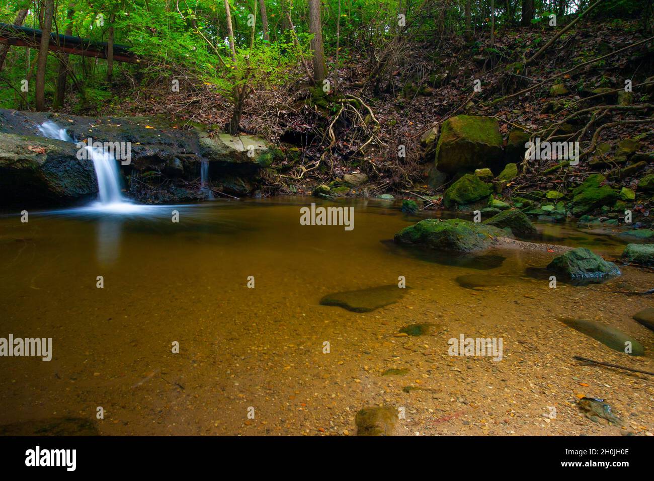 A Small Waterfall In Farm Creek Stock Photo - Alamy
