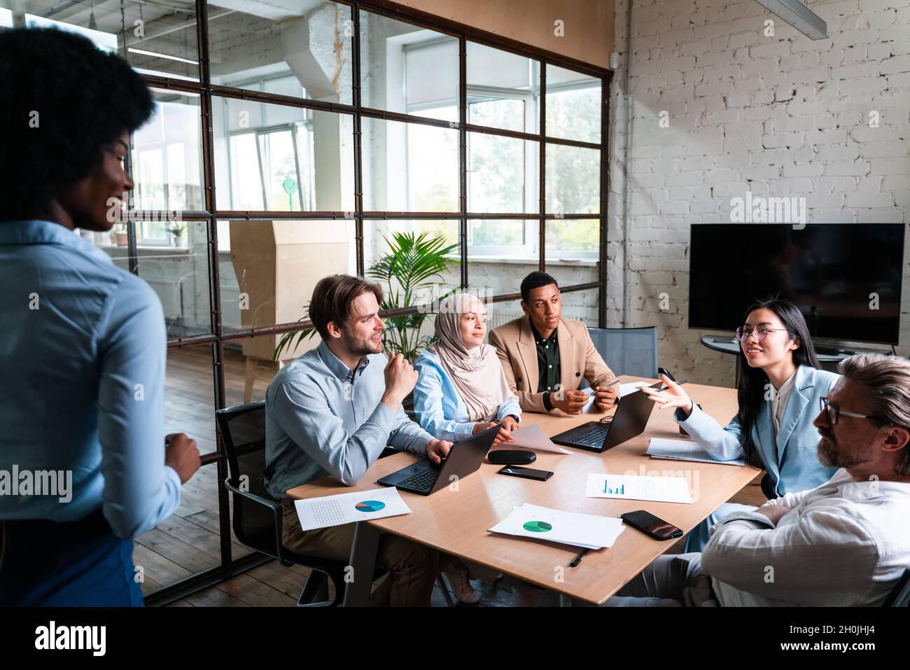 start up business team in the office. Multiethnic group working ...