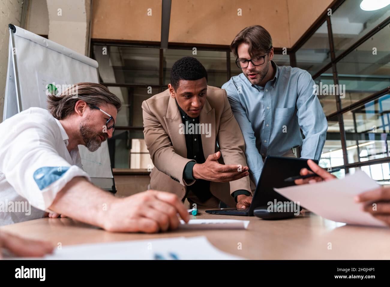 start up business team in the office. Multiethnic group working ...