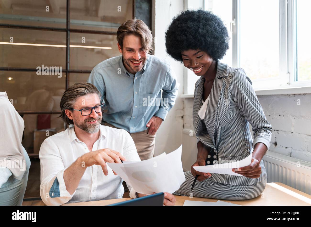 start up business team in the office. Multiethnic group working ...