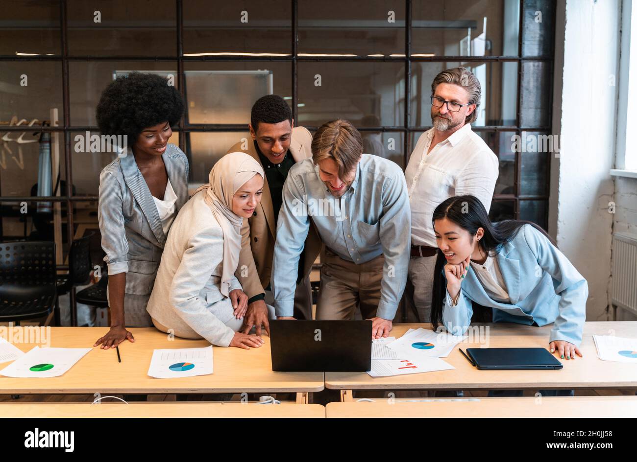 start up business team in the office. Multiethnic group working ...