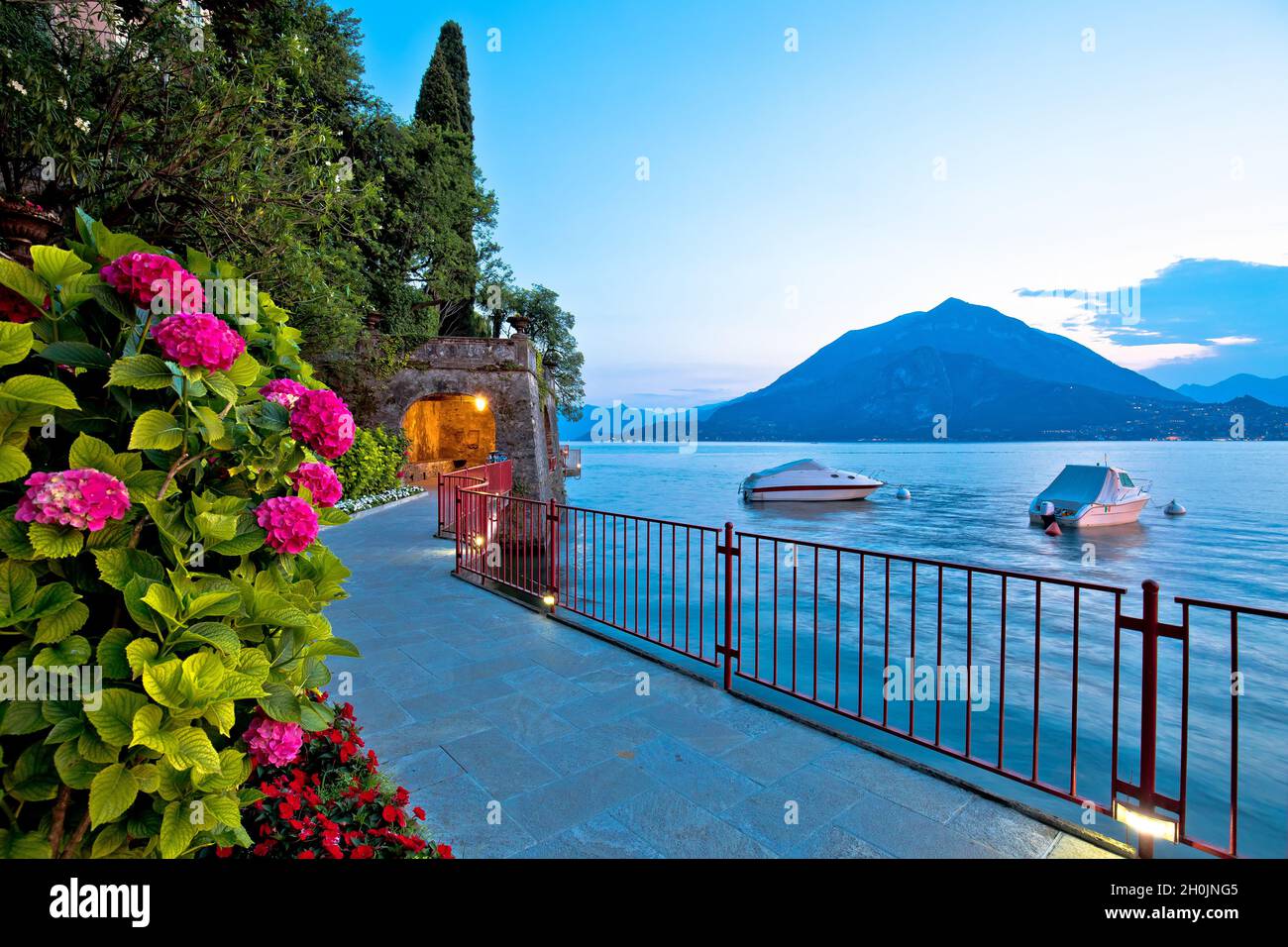 Town of Varenna scenic lakeside walkway evening view, Como lake ...