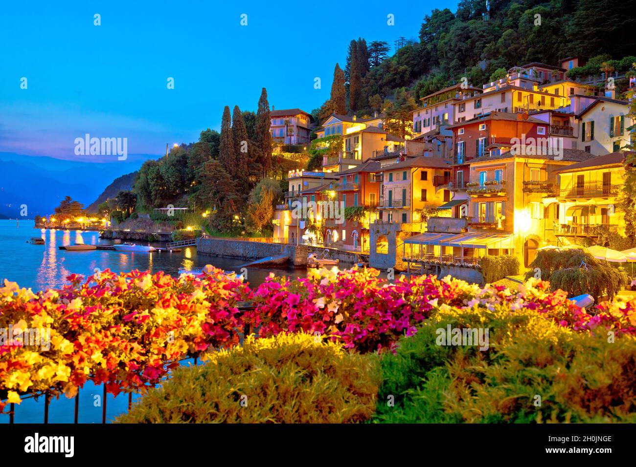 Colorful Varenna scenic lakeside waterfront and Como lake evening view ...
